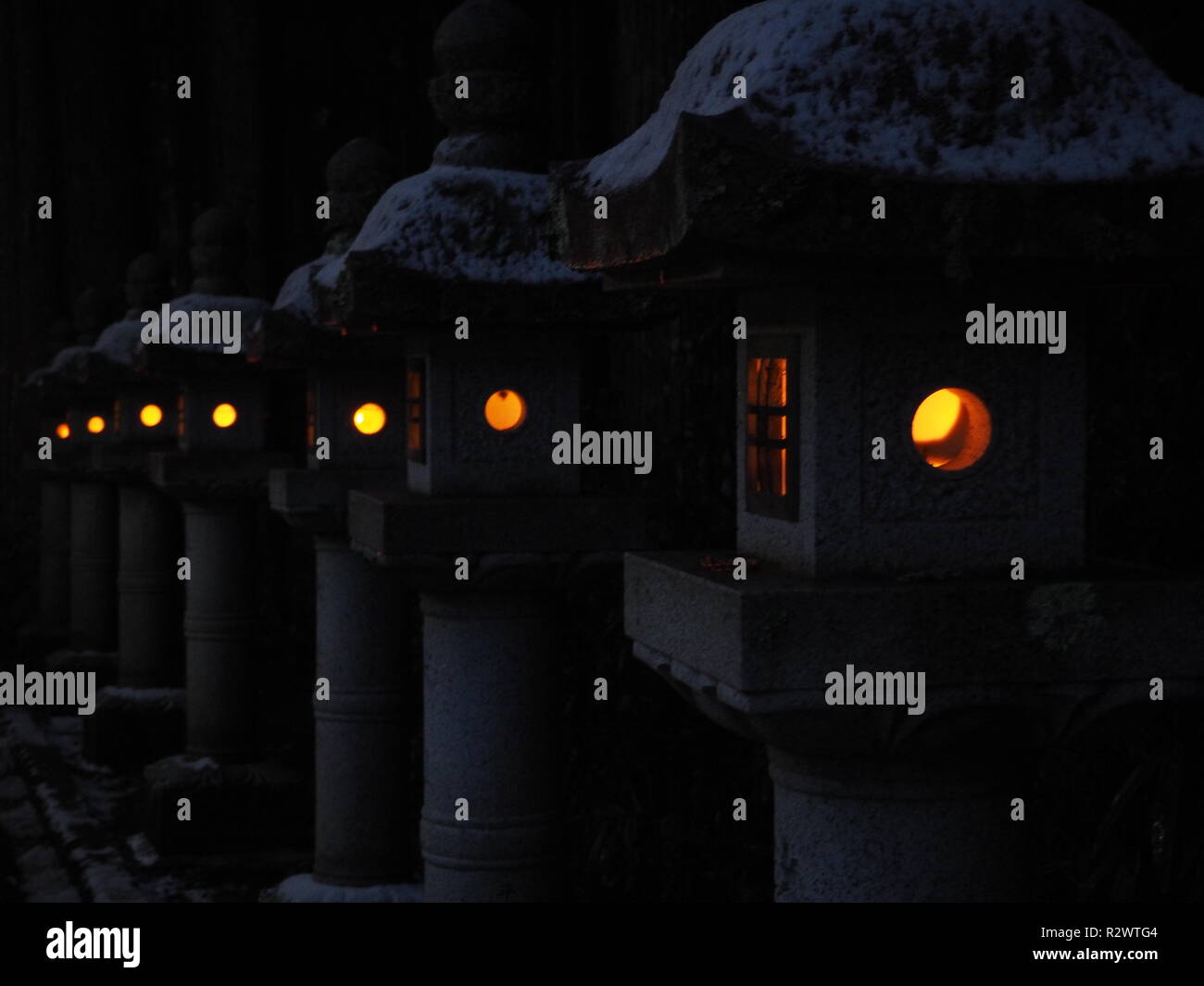 Stone lantern lights in Okunoin Cemetery, Koyasan Japan Stock Photo - Alamy