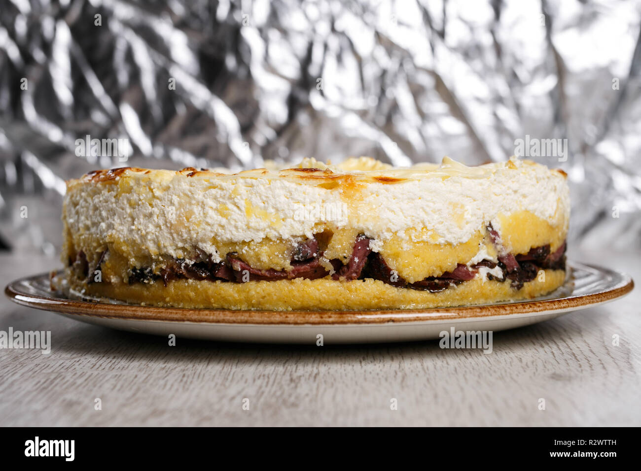 Romanian traditional food, polenta and cheese with sheep meat, bulz and ...