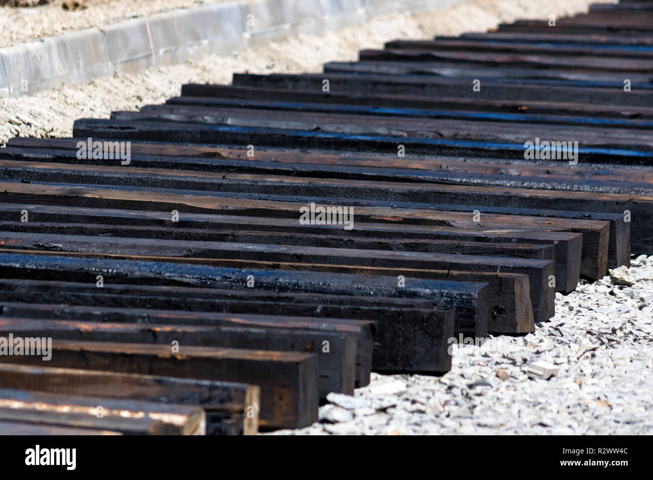 Cross ties of unfinished railway track on construction site Stock Photo ...