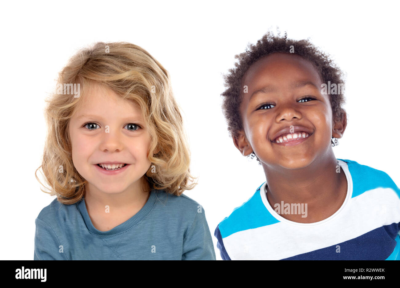 Two happy children looking at camera isolated on a white backround ...