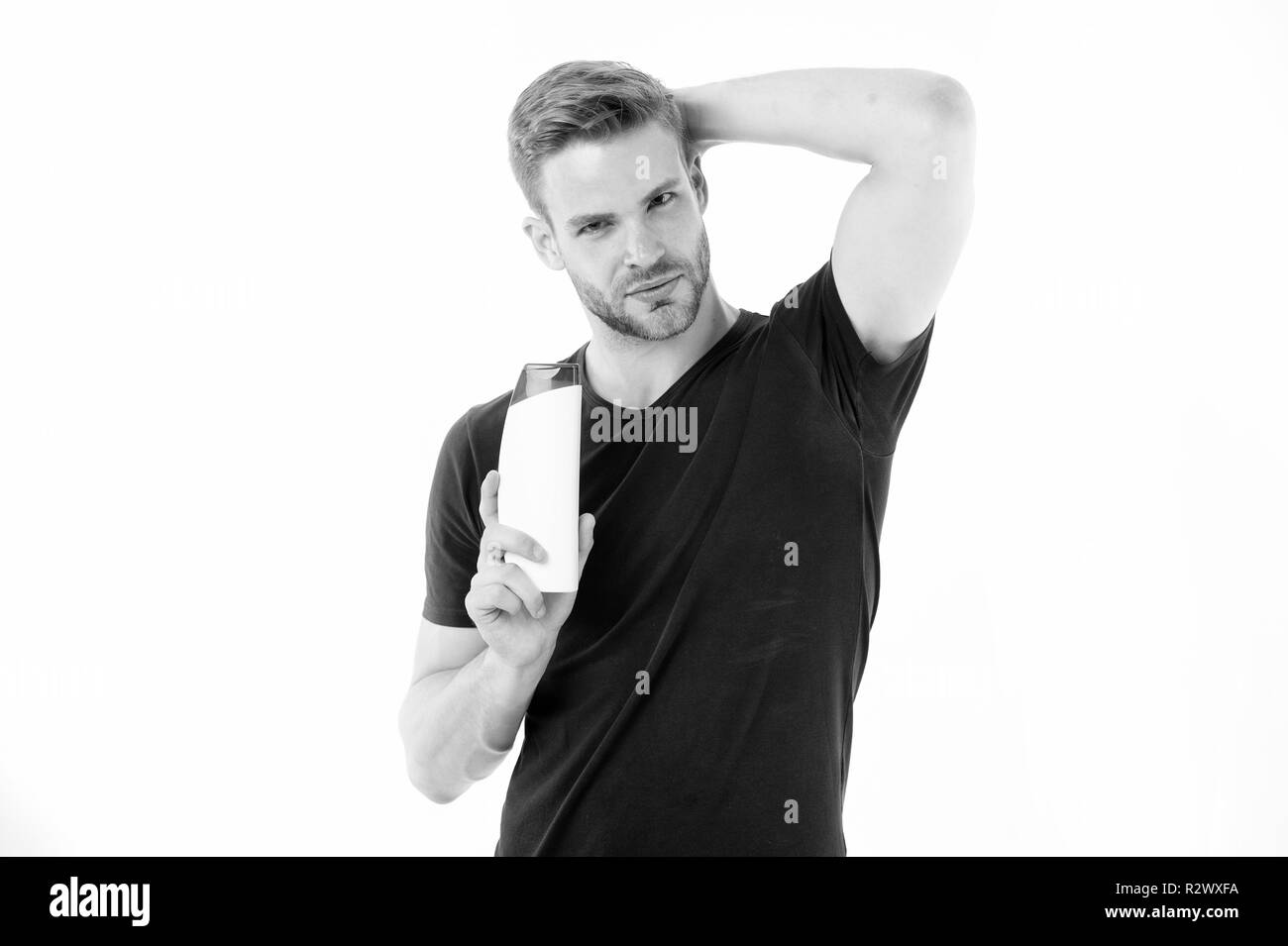 shampoo. hair care with shampoo. shampoo in hand of man. man hold ...