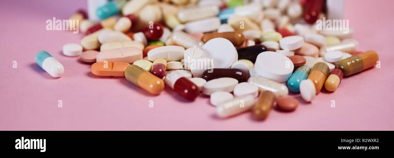 Many colorful medicines and tablets as a medicine concept header Stock ...