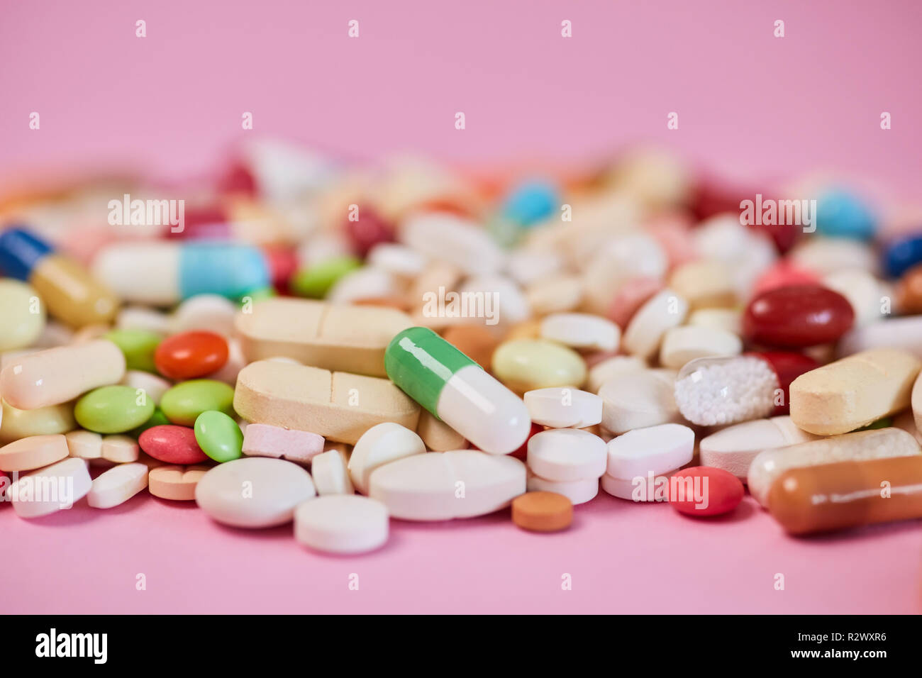 Pharmacy remedy concept with many colorful medicines Stock Photo - Alamy