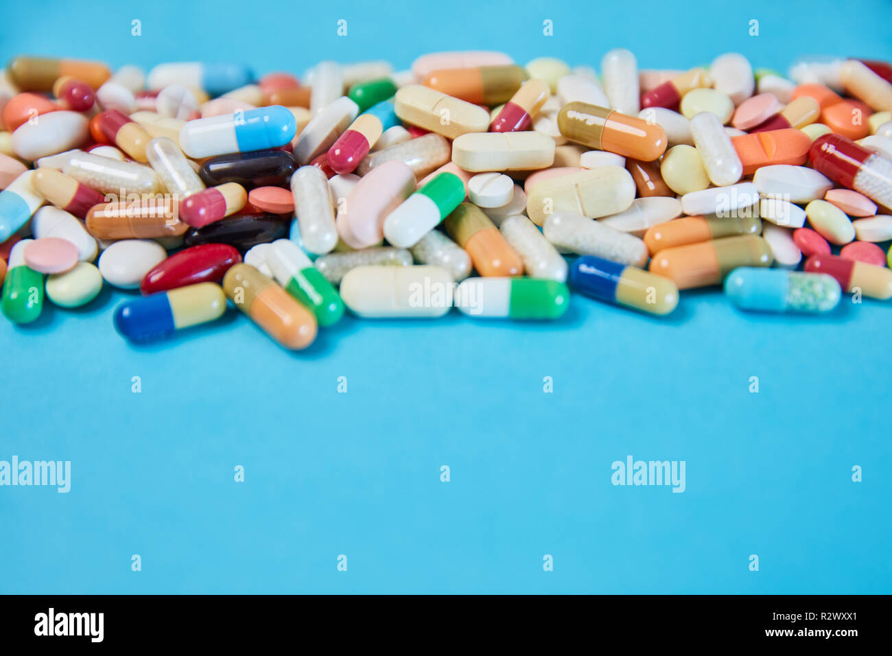 Colorful tablets and remedy as medicine background banner Stock Photo ...