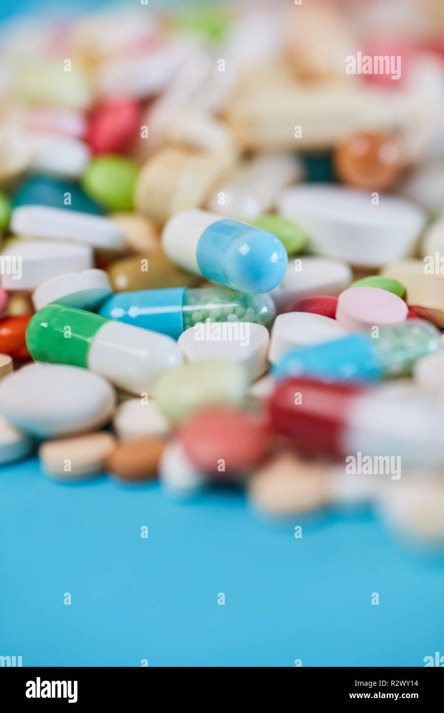 Medicine background with a bunch of colorful medicines Stock Photo - Alamy