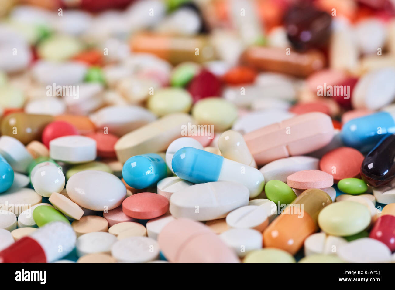 Medicine background with many different colorful medicines Stock Photo ...
