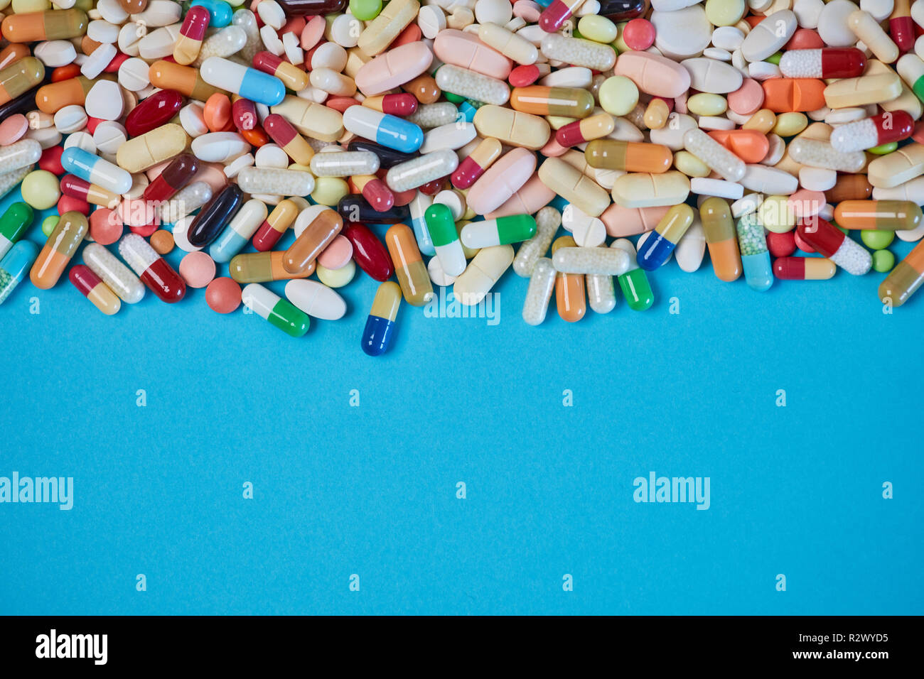 Colorful drugs on the edge as background with copy space Stock Photo ...