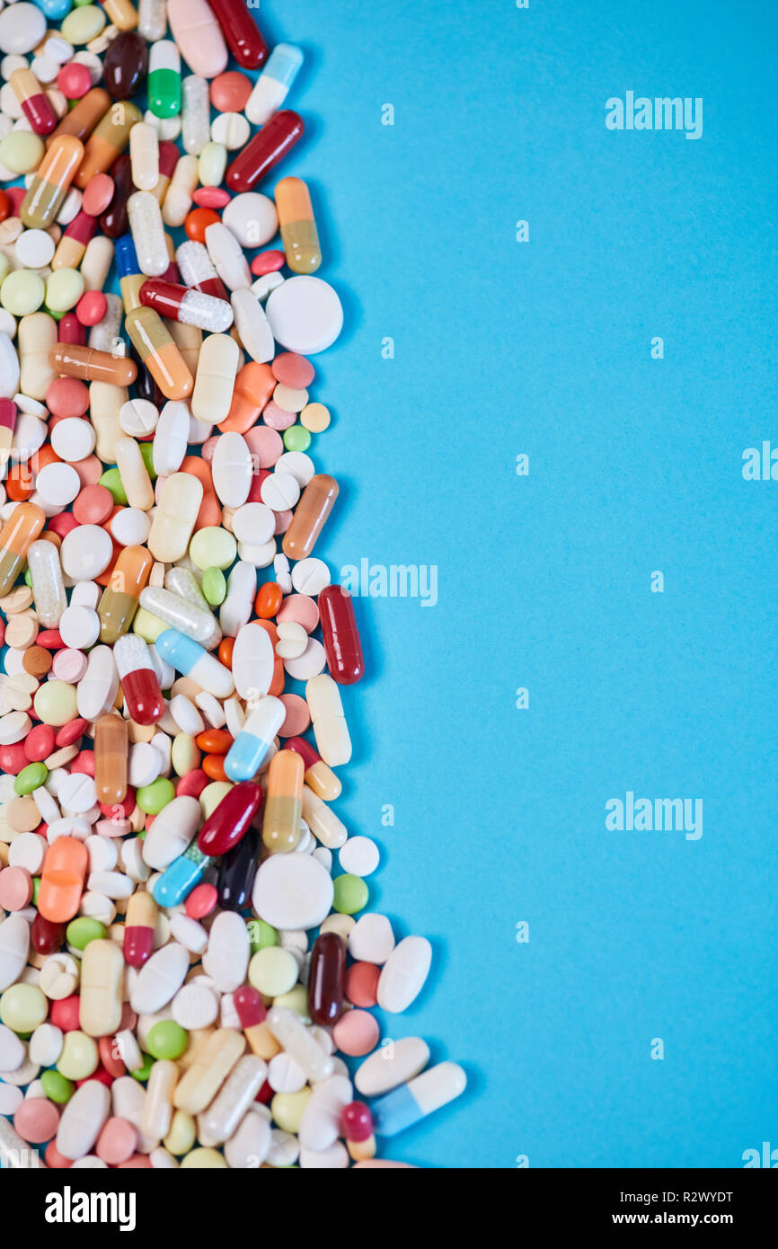 Colorful medicine medication as border with copy space Stock Photo - Alamy