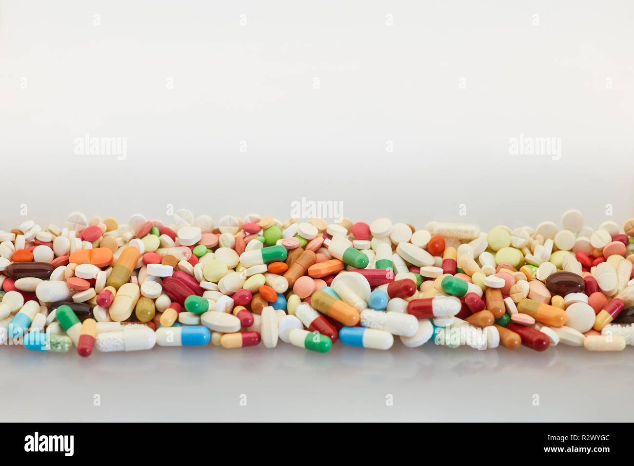 Many colorful medicines as header banner background Stock Photo - Alamy