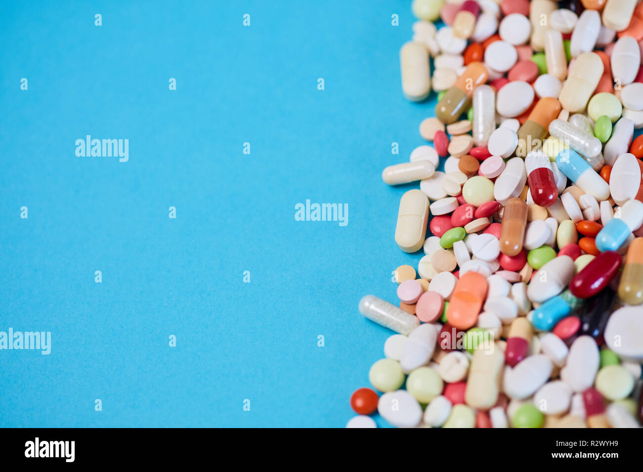 Medicine background with many different colorful medications and copy ...