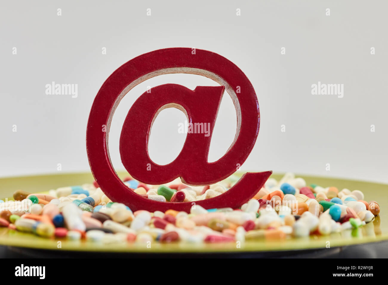 Mail order pharmacy on the internet with medication and email symbol ...