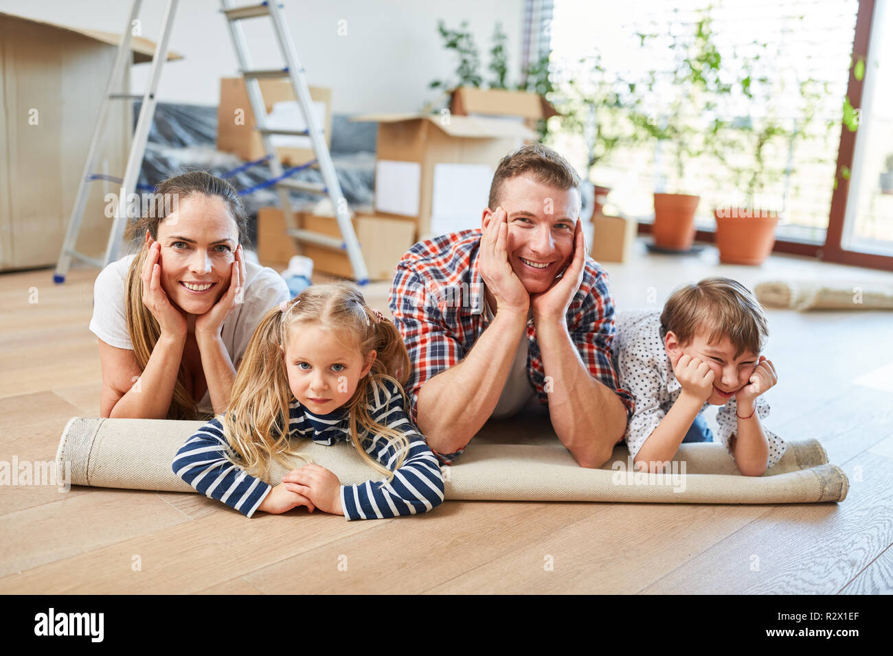Parents and children at home hi-res stock photography and images - Alamy