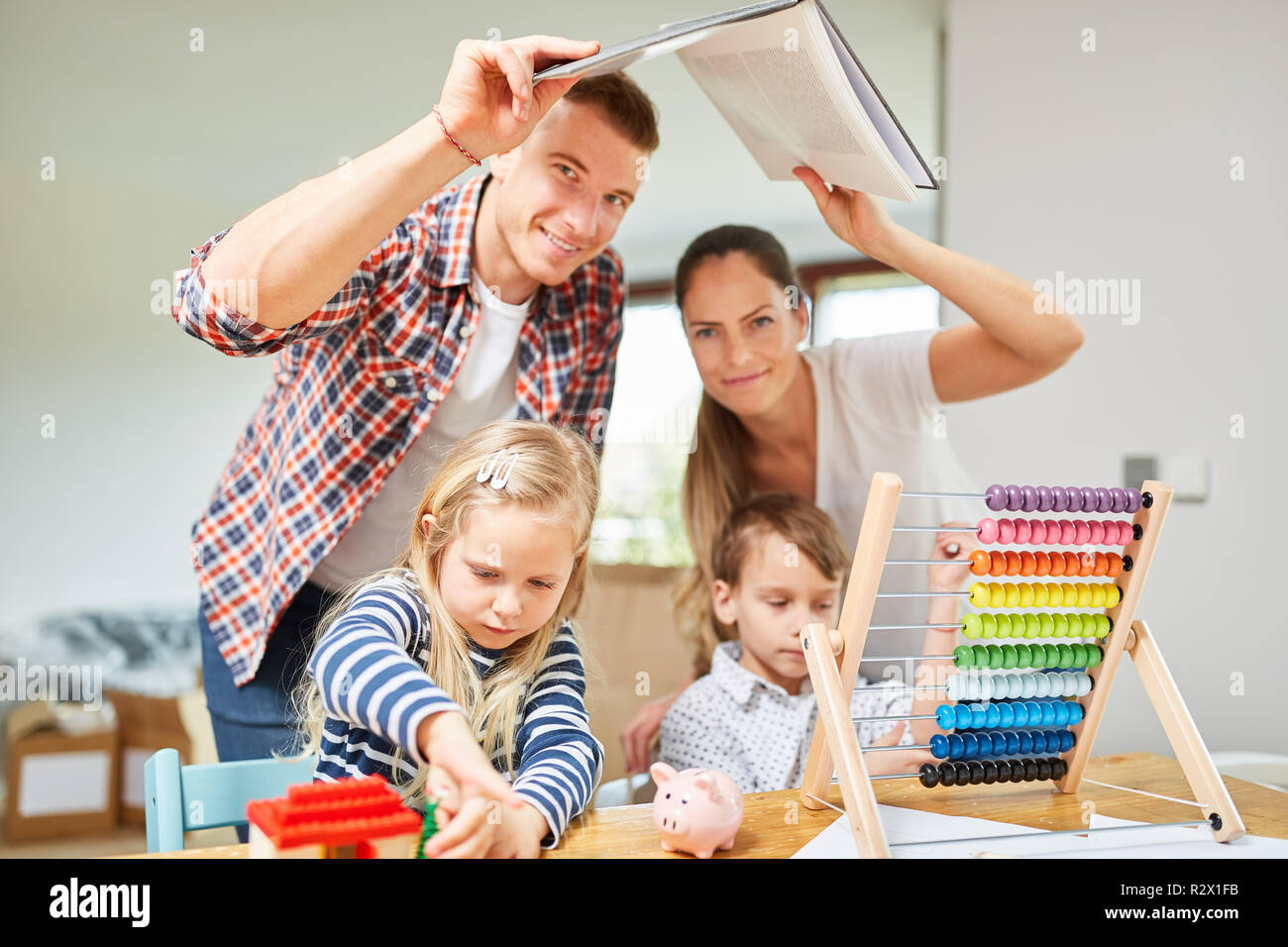 Family with children dreams of building a house and looks forward to a ...