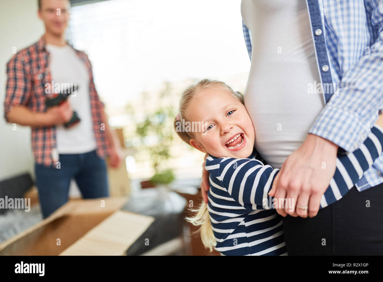 Woman holds child listen hi-res stock photography and images - Alamy
