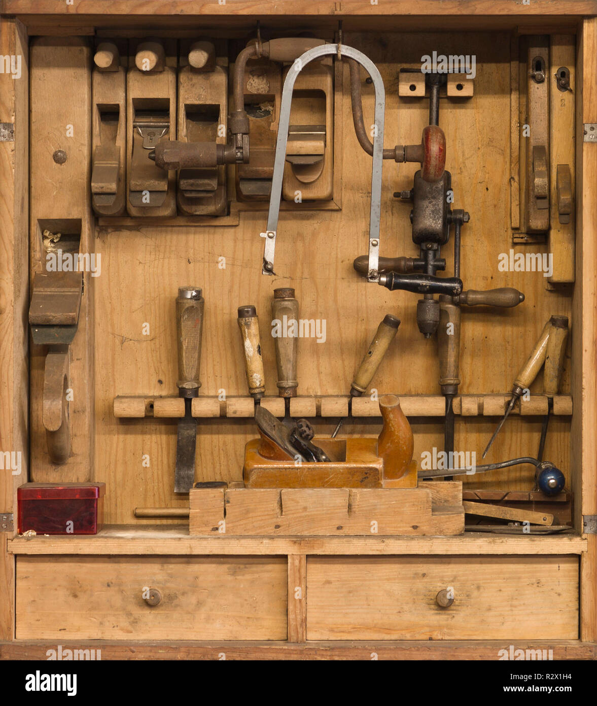 carpenters tools in a wooden cabinet Stock Photo - Alamy