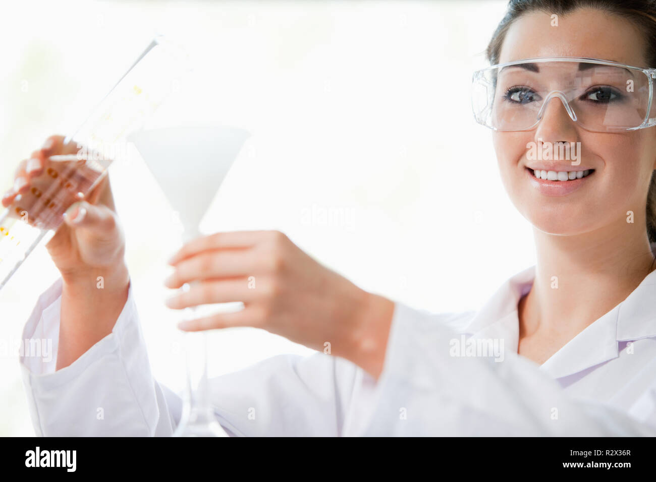Graduated cylinder funnel hi-res stock photography and images - Alamy