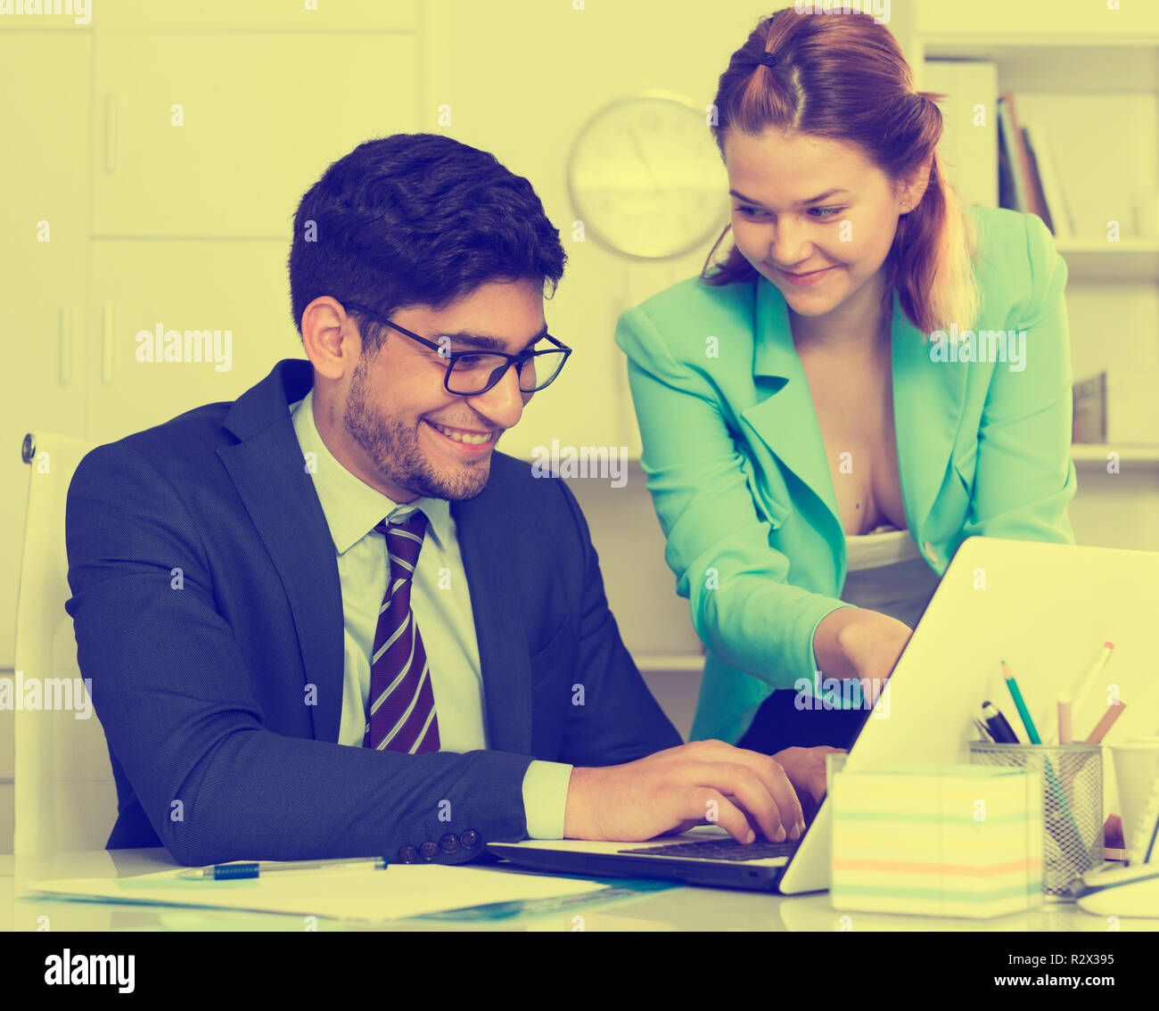 Focused business team working with computer in modern office Stock ...