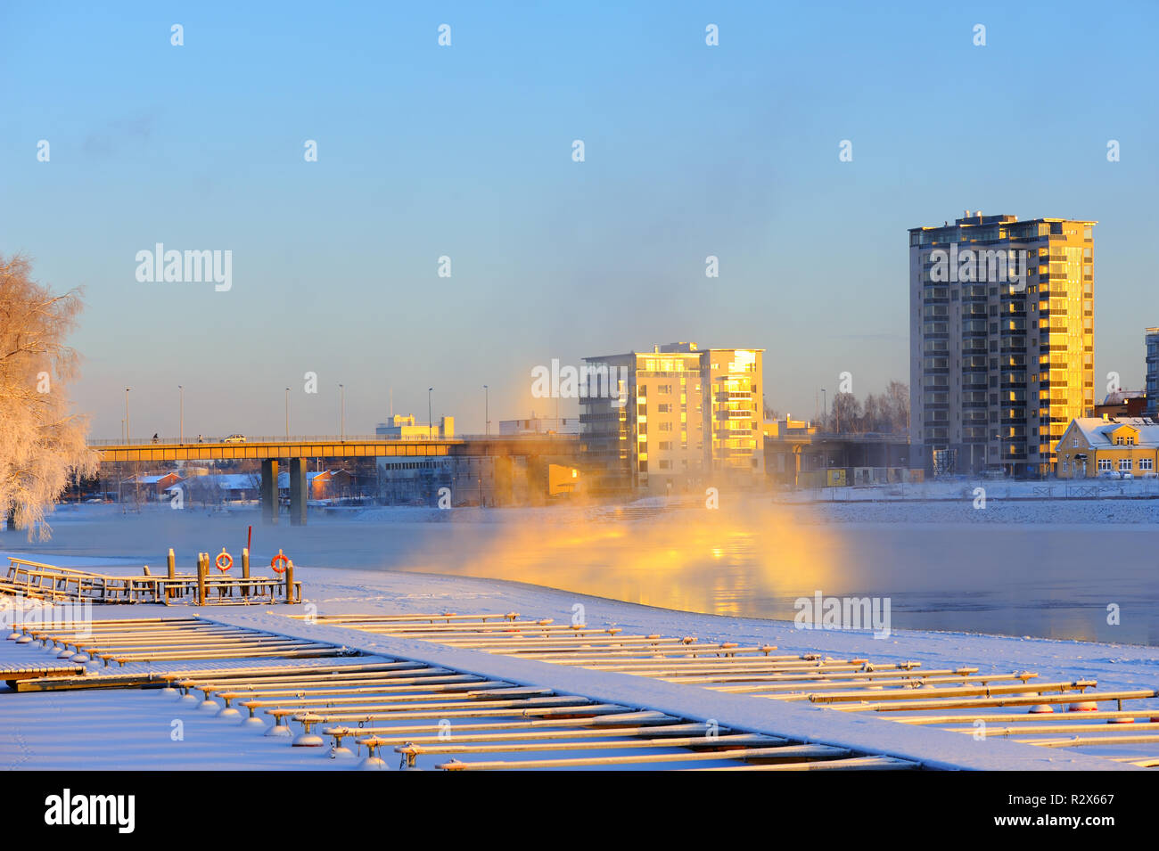 Bridge buildings along riverbank hi-res stock photography and images ...