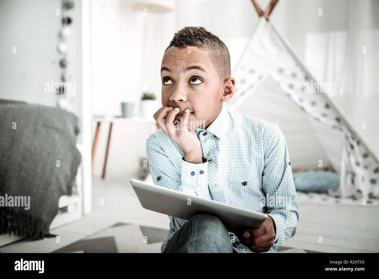 Thoughtful boy hi-res stock photography and images - Alamy