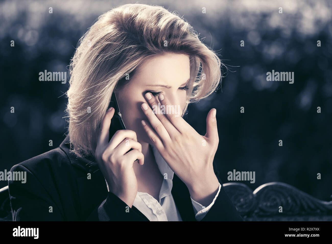 Sad woman crying on street hi-res stock photography and images - Alamy