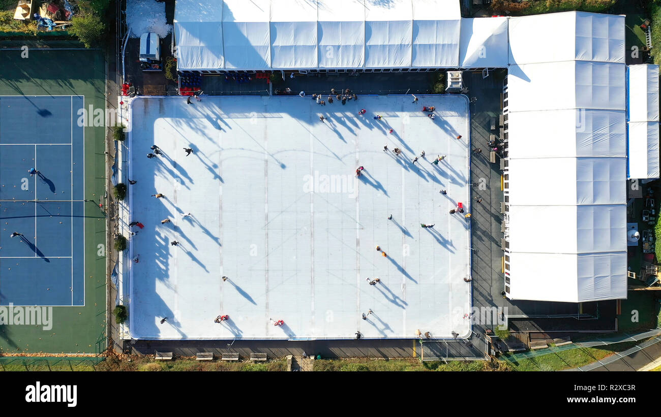 Aerial view of people ice skating on an outdoor ice rink Stock Photo ...