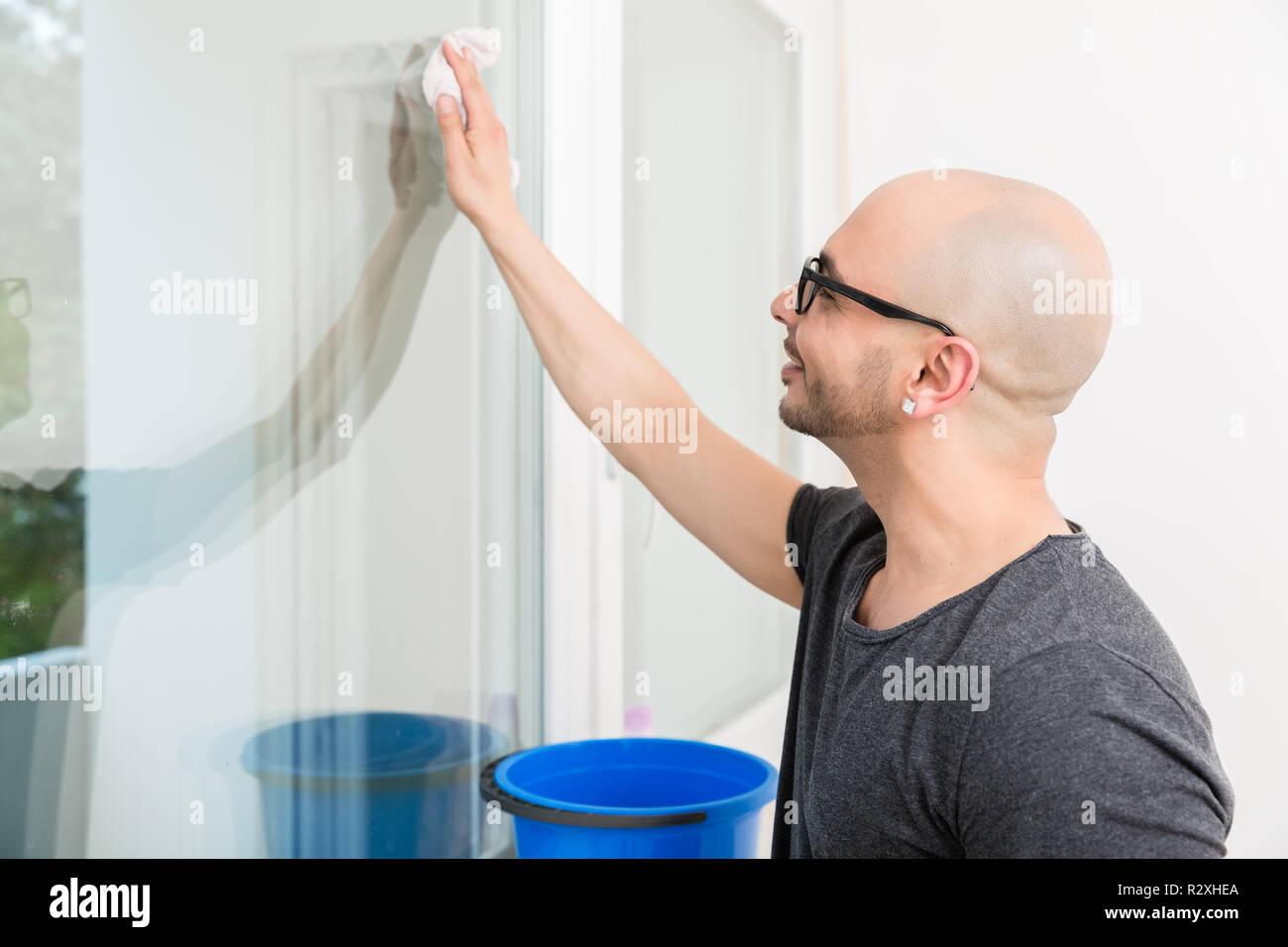 Man washing cloth hi-res stock photography and images - Alamy
