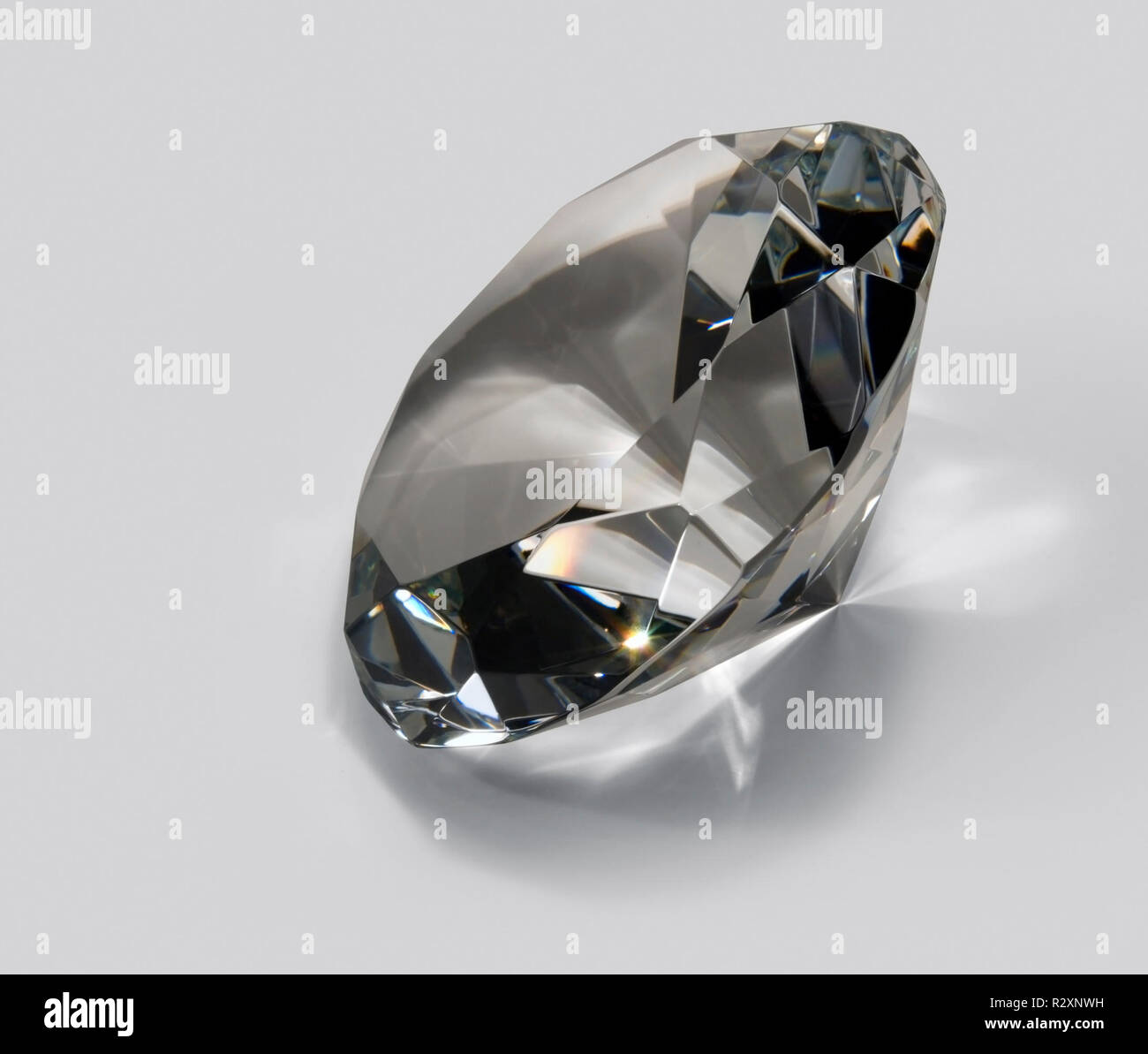 clear diamond in light back Stock Photo - Alamy