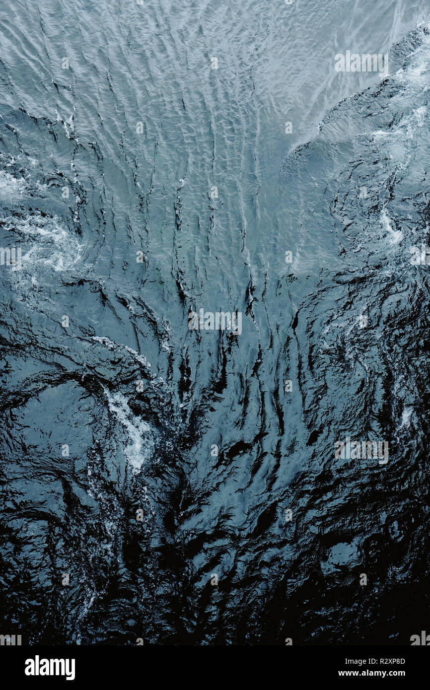 Flowing river water torrent texture nature background - aerial looking ...