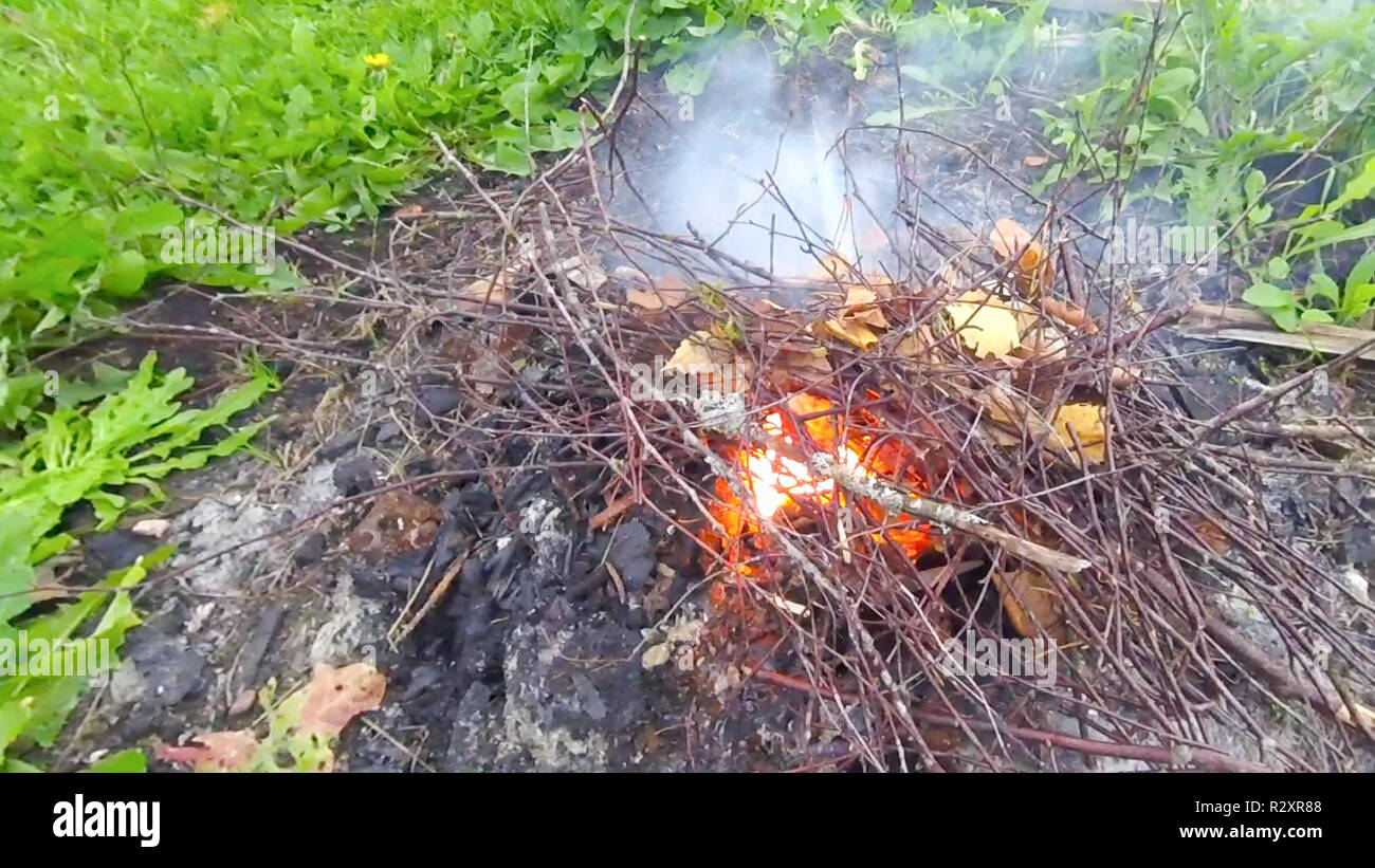The fire is ignited in a fire of twigs and branches Stock Photo - Alamy