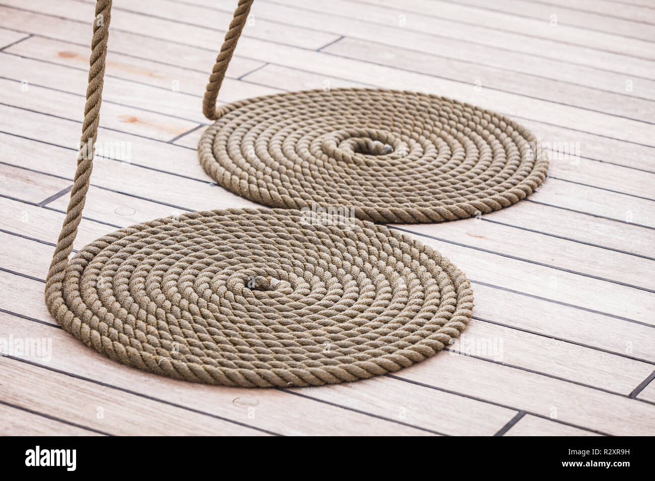 Old nautical objects concept. Circle rounded antique chest rope coil on ...