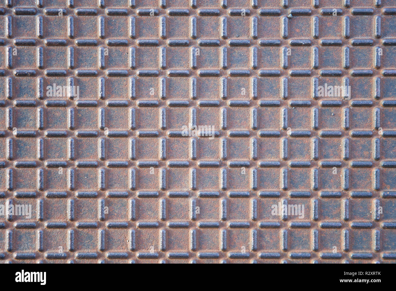 Detail of the manhole cover metallic backdrop Stock Photo - Alamy