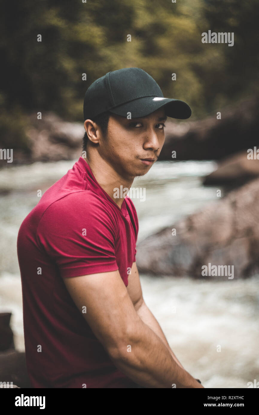 Adventurer guy chilling in the nature Stock Photo - Alamy