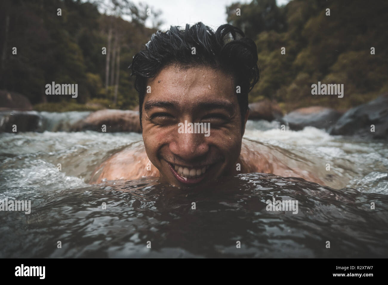 Man bathing in a river hi-res stock photography and images - Alamy