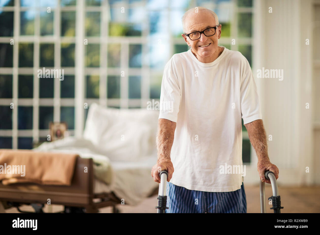 Old man with walker field hi-res stock photography and images - Alamy