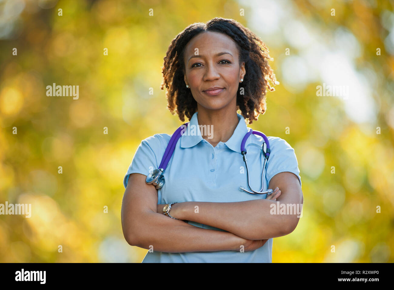 Portrait of a confident female nurse with her arms crossed Stock Photo ...
