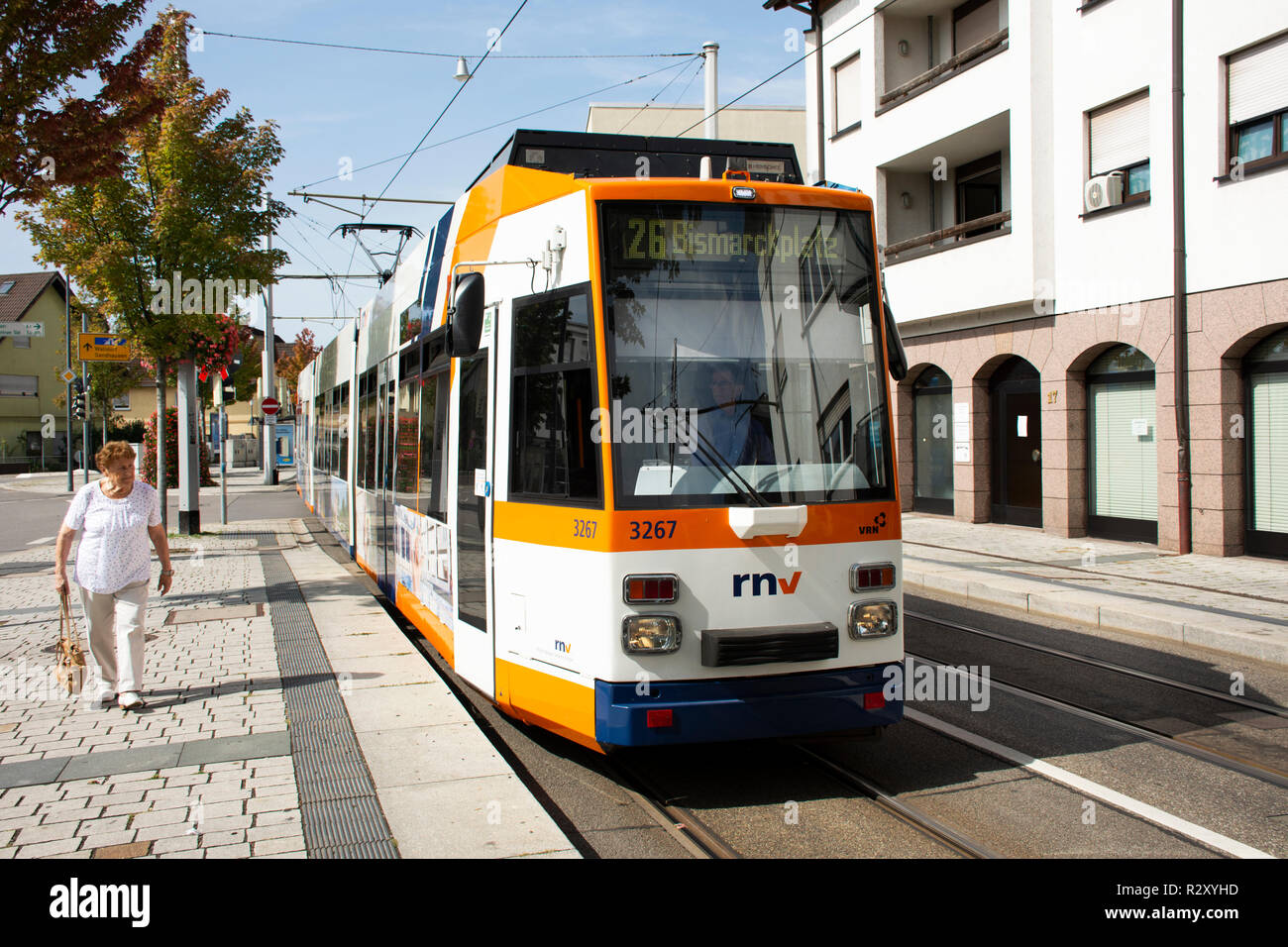 Tramway run and stopping for send and receive passengers German people ...