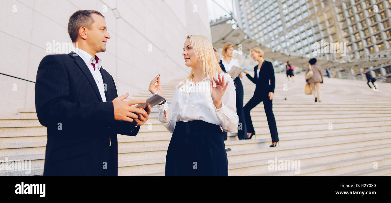 Foreign business colleagues in official journey talking and keep Stock ...