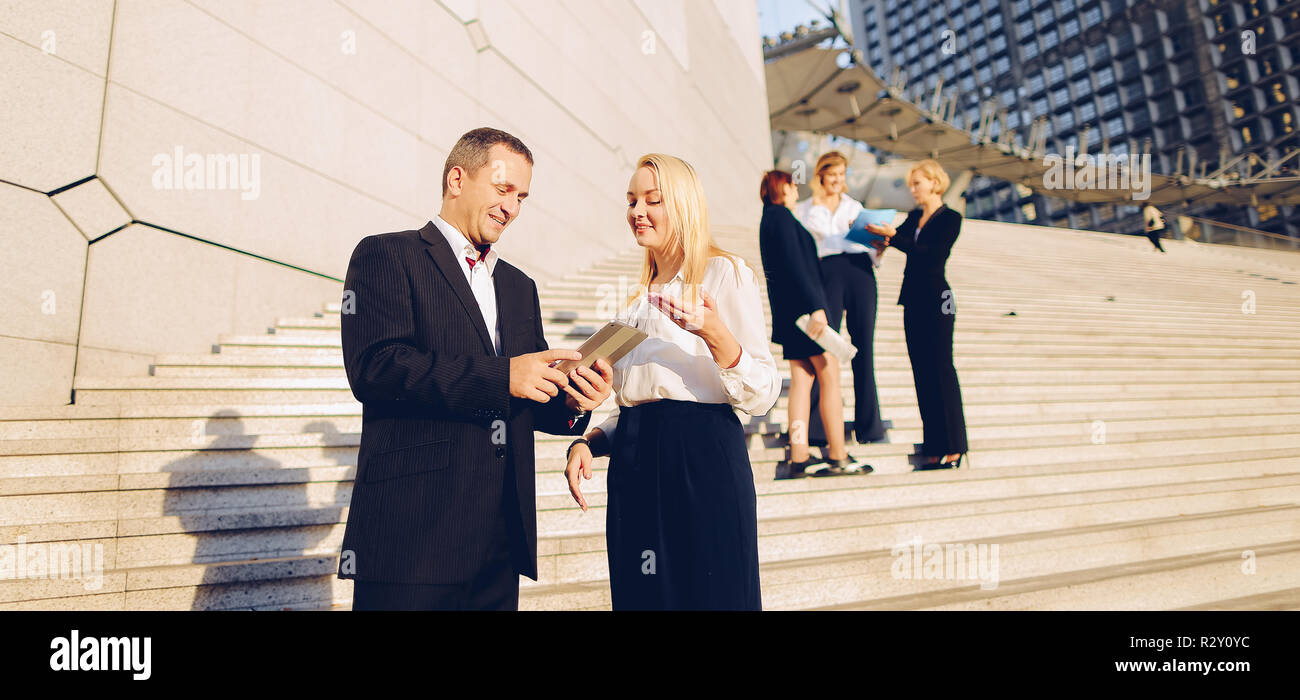 Foreign business colleagues in official journey talking and keep Stock ...