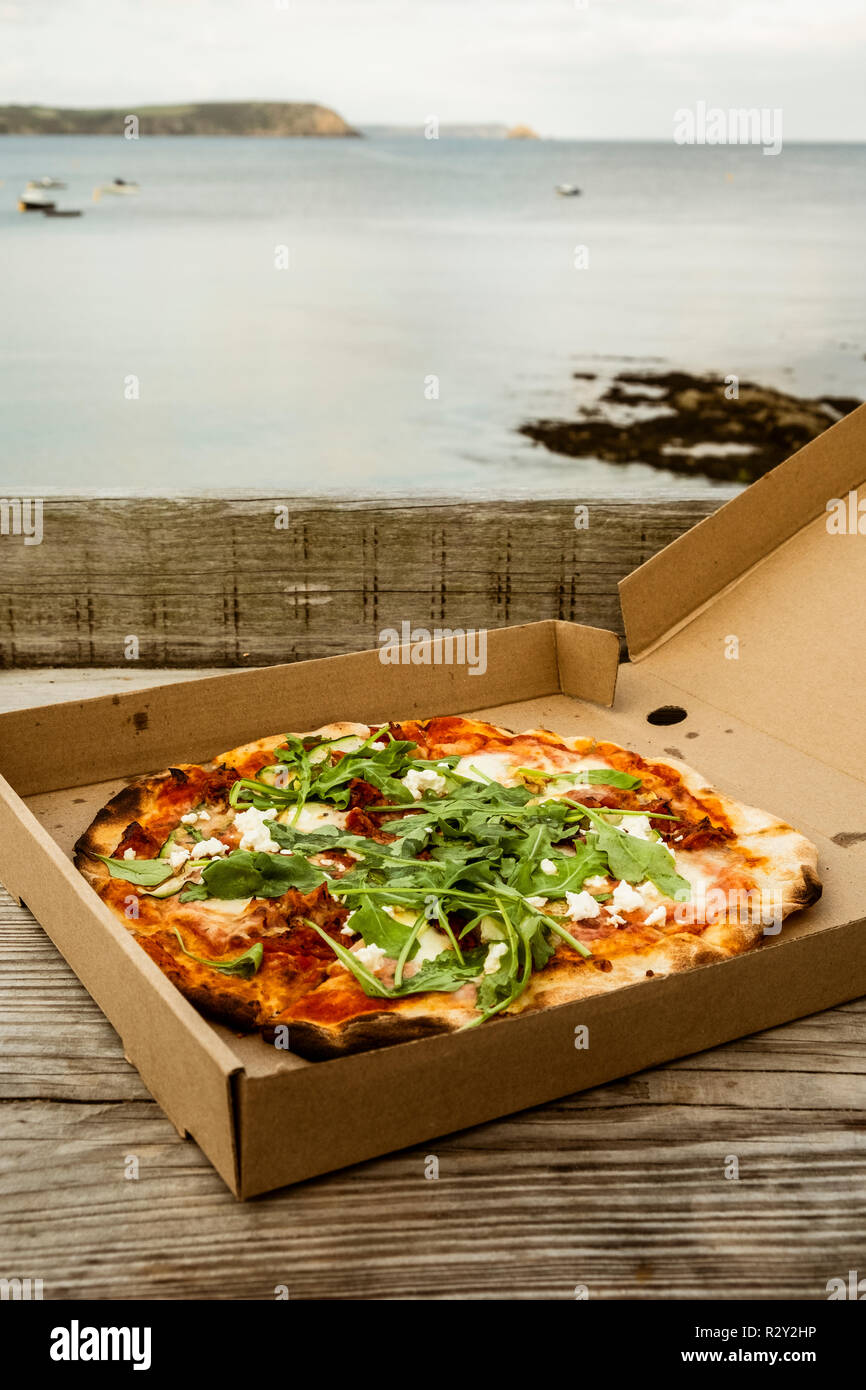 A takeaway pizza in a brown box Stock Photo - Alamy