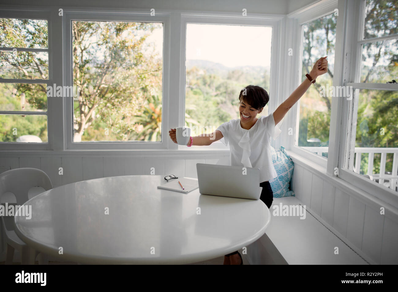 Young woman working from home Stock Photo - Alamy