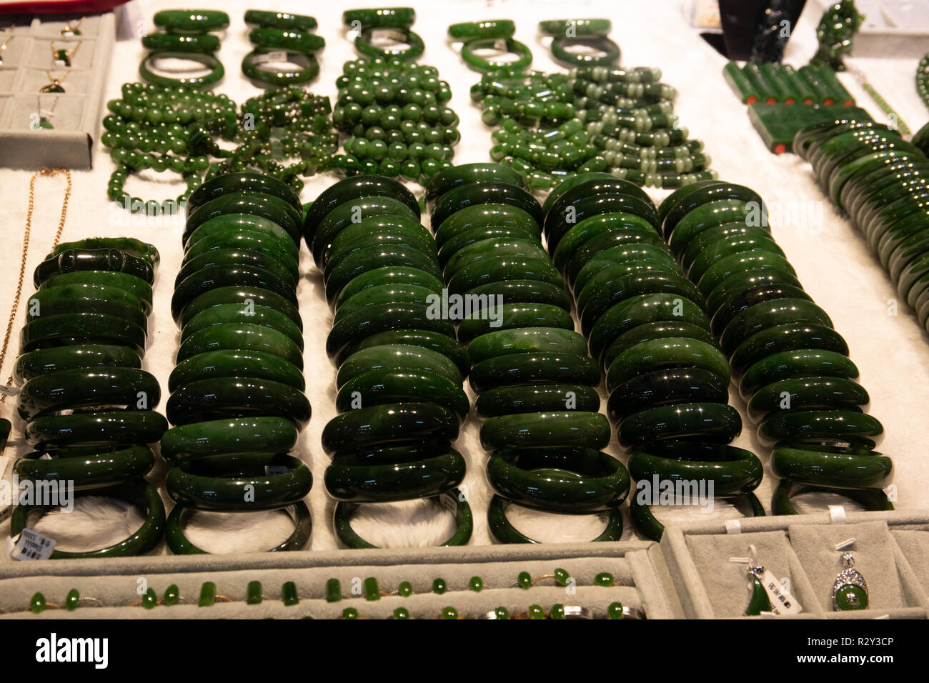 Jade bracelets and rings for sale at the Jiangup Holiday Jade Market in ...