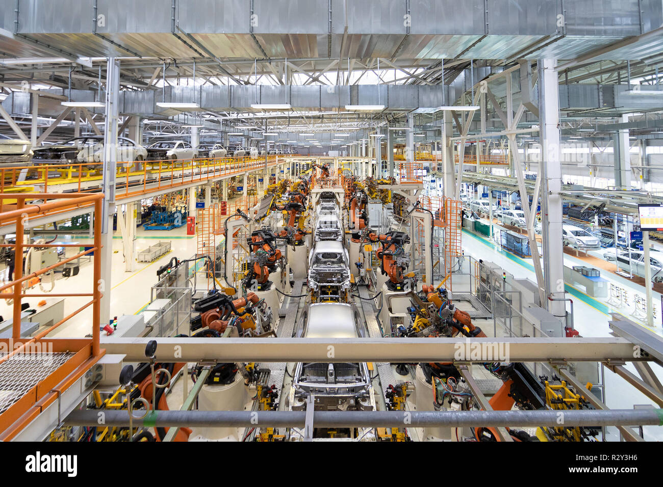 body of car on conveyor Modern Assembly of cars at plant. automated ...