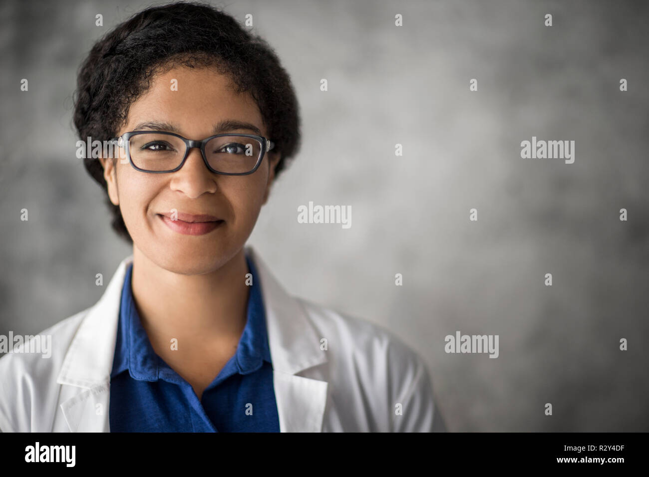 Portrait of a scientist wearing a lab coat Stock Photo - Alamy