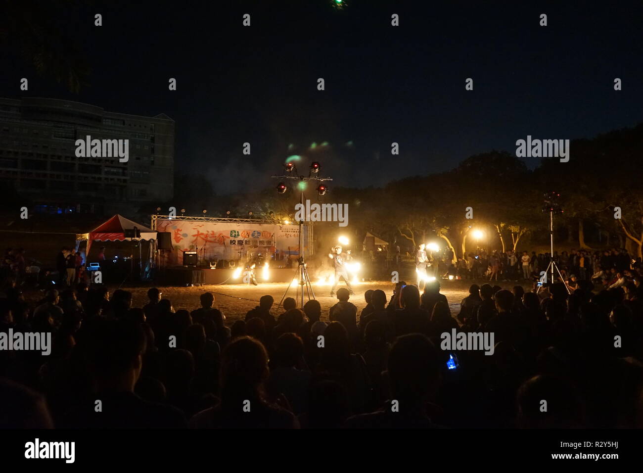 People are watching the gorgeous campfire show Stock Photo - Alamy