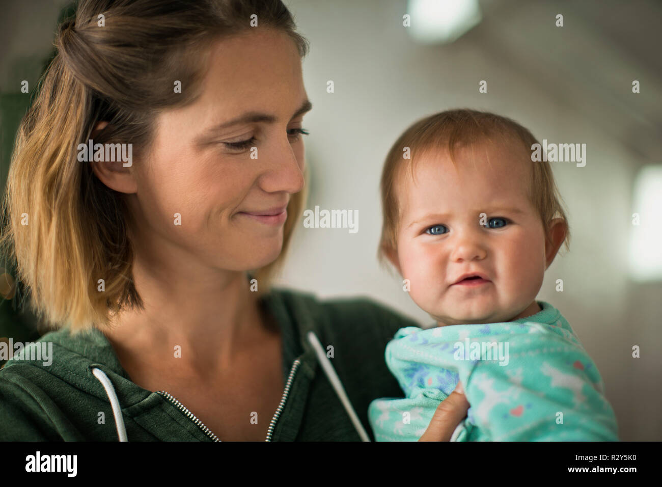 Loving mother holds child on hi-res stock photography and images - Alamy