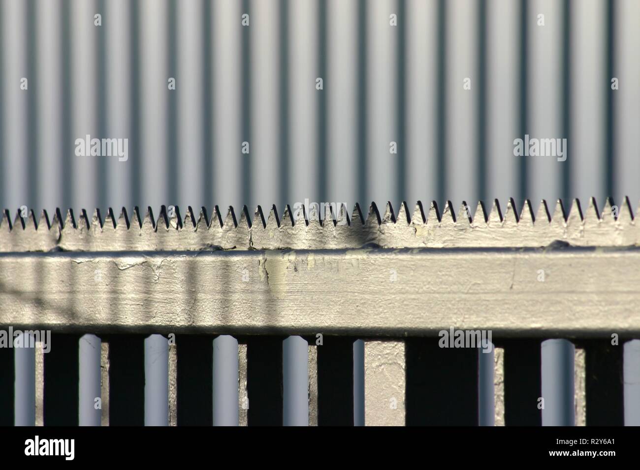 iron gate with spikes Stock Photo - Alamy