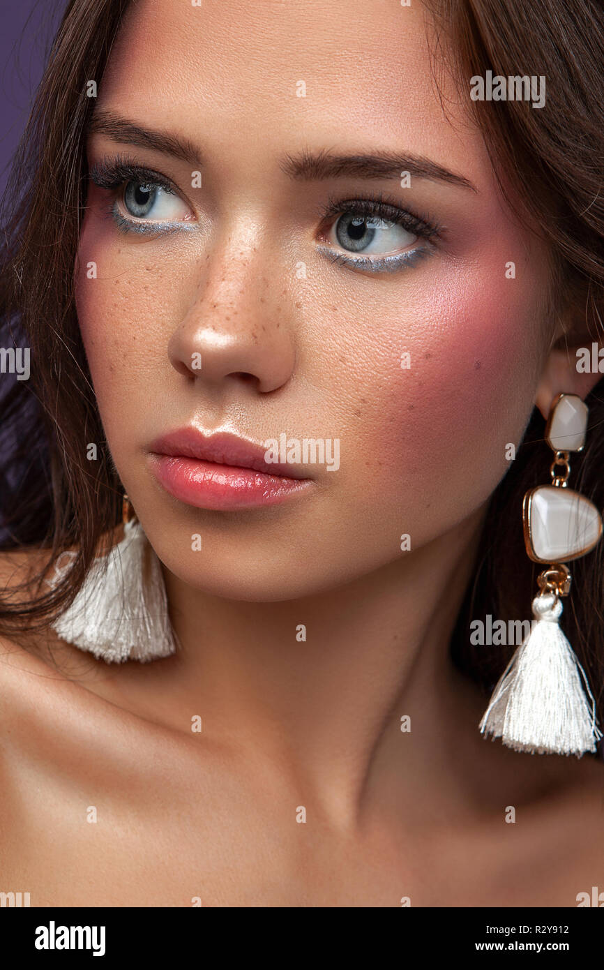 Big earrings hi-res stock photography and images - Alamy