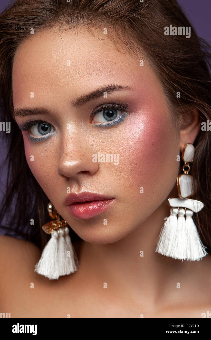 Beauty portrait with earrings hi-res stock photography and images - Alamy
