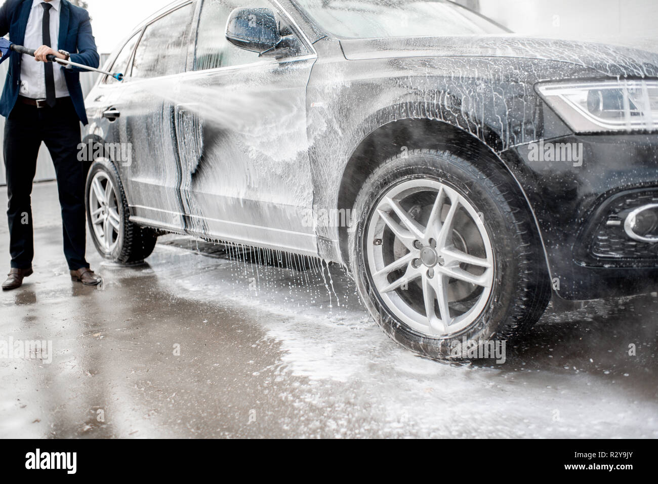 Man water gun hi-res stock photography and images - Alamy