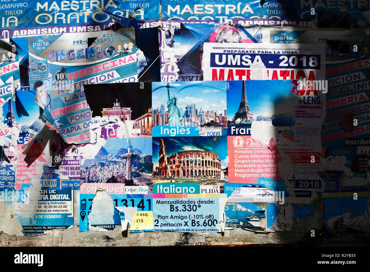 Layers of posters advertising language courses near UMSA University, La ...